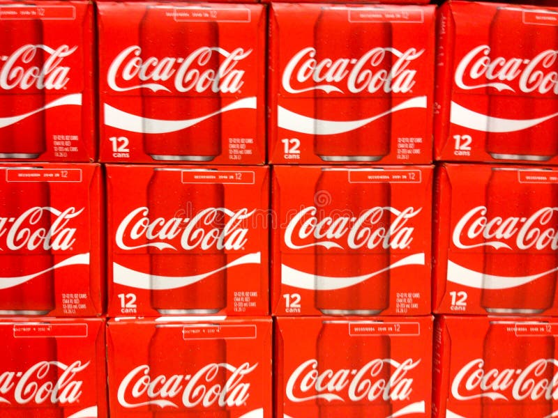 Coke Coca Cola Classic Cans Cases Stacked in Supermarket Background ...