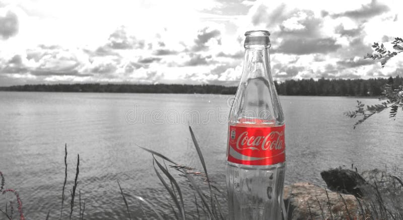 Coke and lake editorial photography. Image of crass, water - 42720482