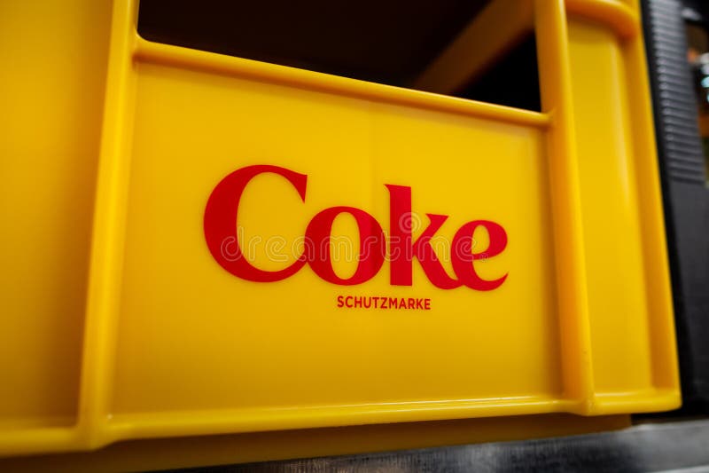 Coke Logo Sign on a Yellow Crate Editorial Image - Image of sign ...