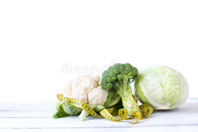 Col Y Coliflor Con Una Medida Dieta Del Concepto Foto de archivo ...