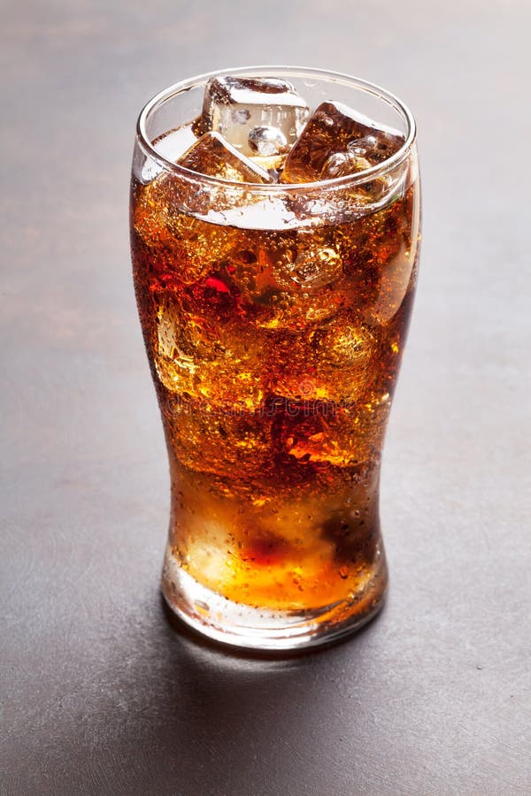 Cola glass with ice stock image. Image of bubbles, closeup - 100074307