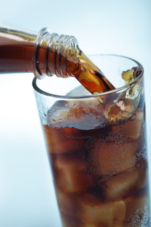 Cola with ice stock photo. Image of drink, bottle, pour - 19391632