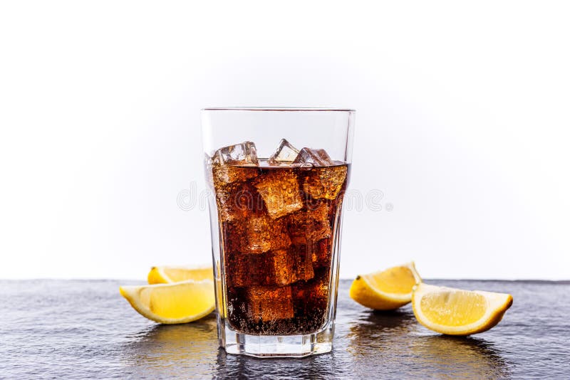 Cola with ice cubes stock photo. Image of juice, drink - 111345120