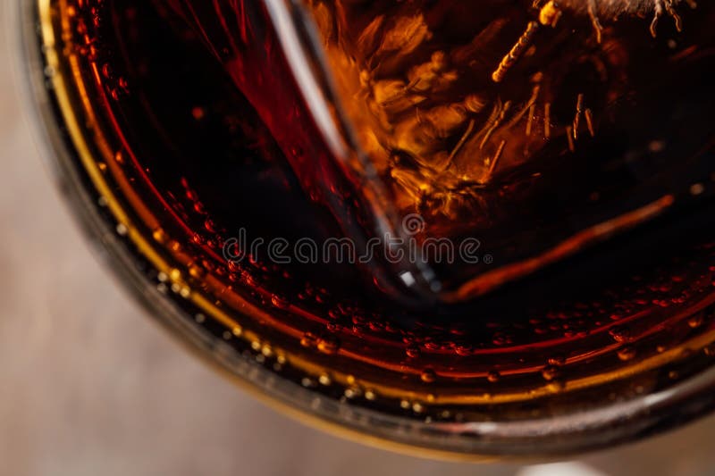 Top Down View of Large Ice in Dark Cola Drink Stock Photo - Image of ...