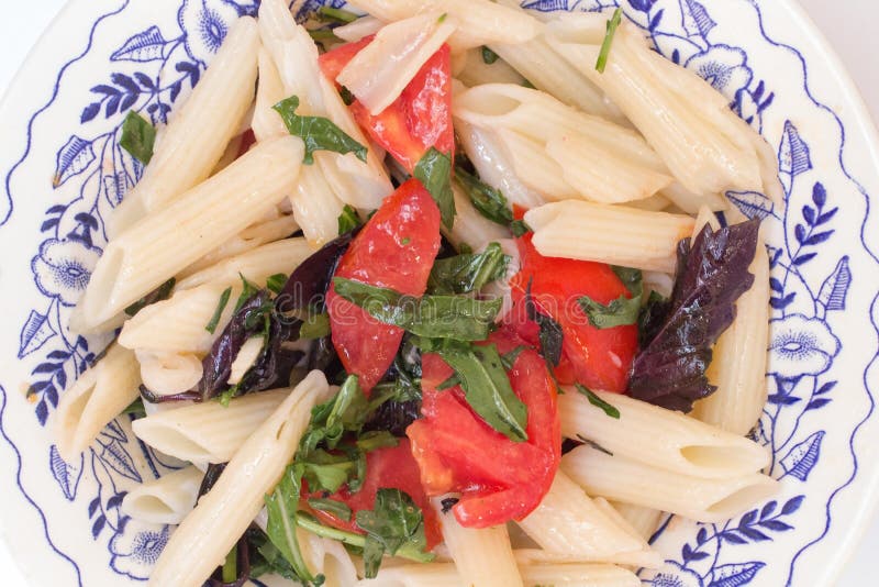 Cold Appetizer of Pasta, Tomato and Basil Stock Photo - Image of eating ...
