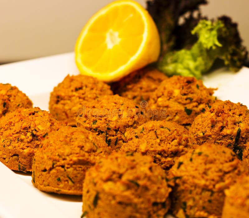 Cold Appetizer of Red Lentils Balls with Lemon and Greens in the Stock ...