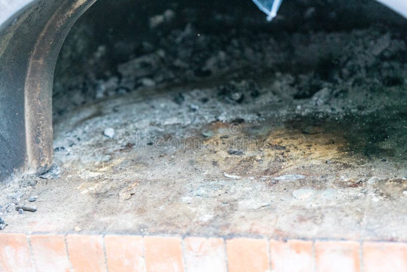 Cold ash in pizza oven stock image. Image of brick, cooking - 97855457