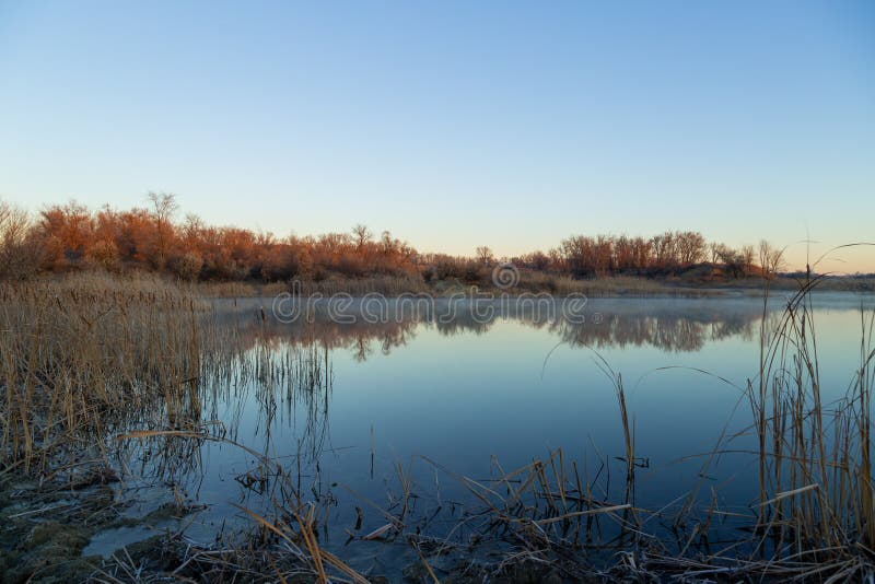 Cold Autumn Morning and Sunrise Over the Lake Stock Photo - Image of ...