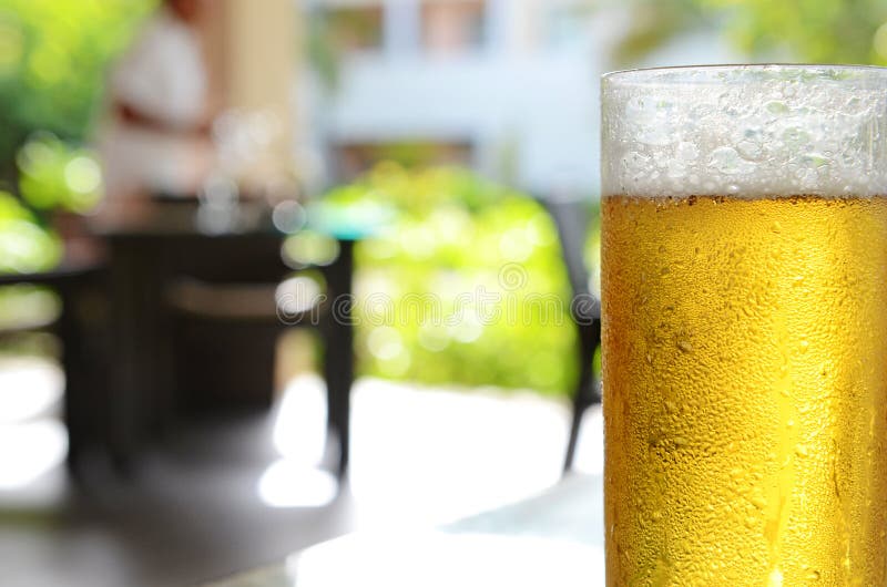 Cold Beer stock image. Image of beautiful, chairs, beer - 26220633