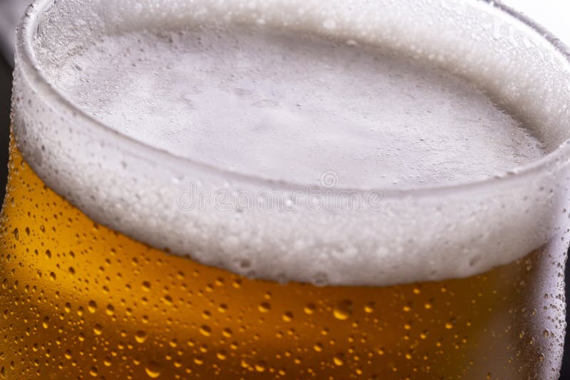 Cold beer close up stock photo. Image of fermentation - 185183998