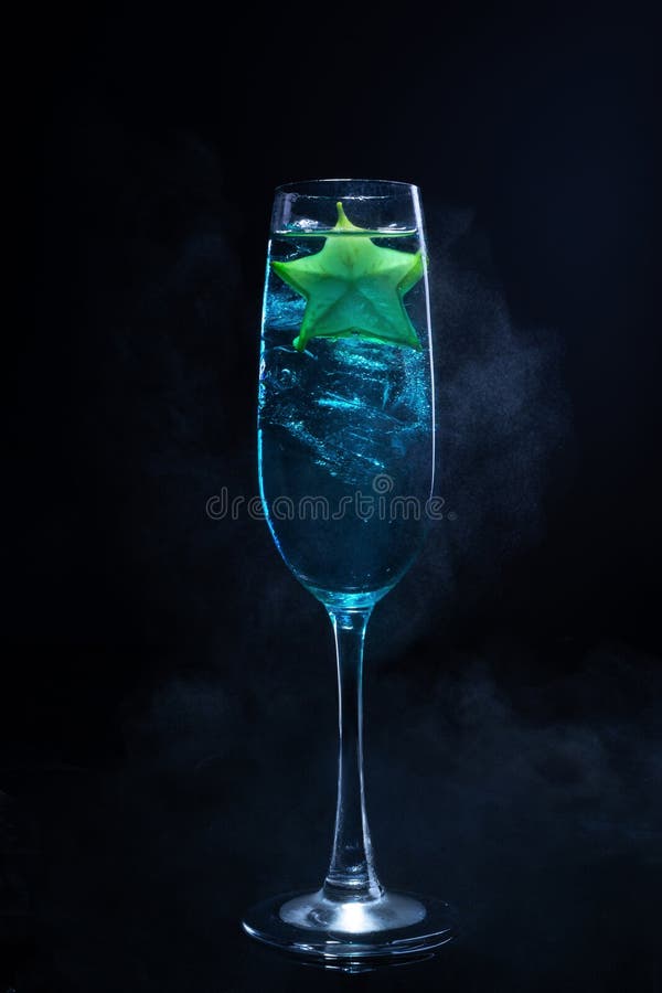 Cold Blue Cocktail with a Star Fruit Garish Stock Photo - Image of ...