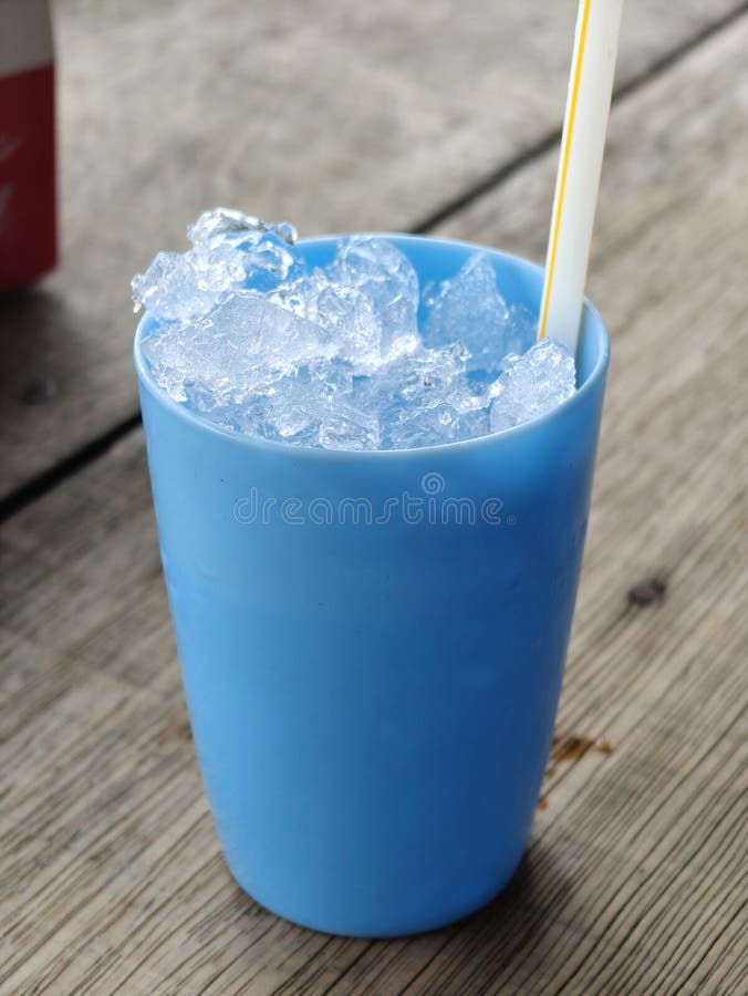 Cold blue drink in a cup stock photo. Image of wooden - 327201022