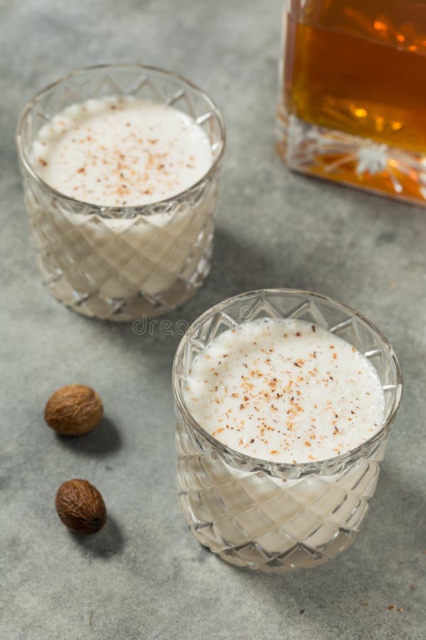 Cold Boozy Rum Milk Punch with Cream and Nutmeg Stock Image - Image of ...