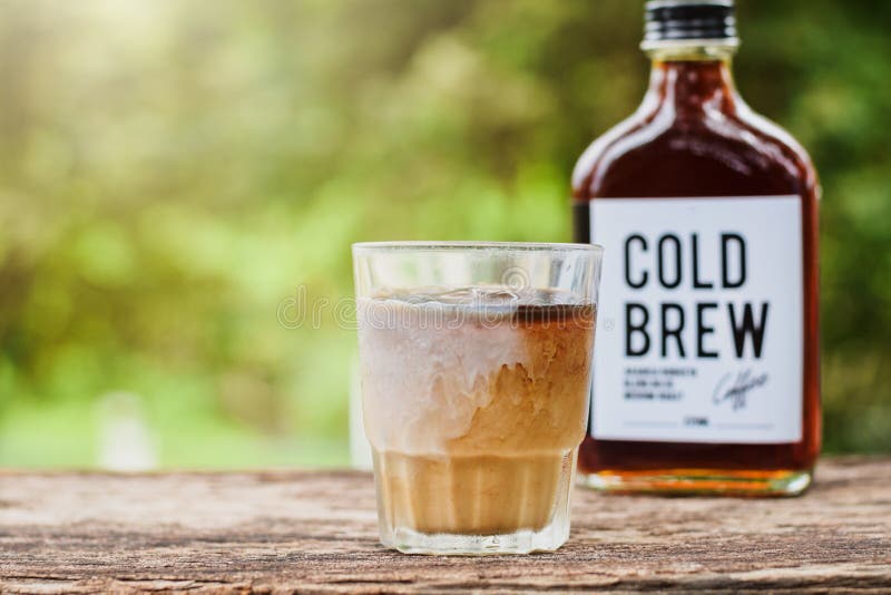 Cold Brew Coffee with Milk on a Table Outside with Cold-brew Coffee in ...