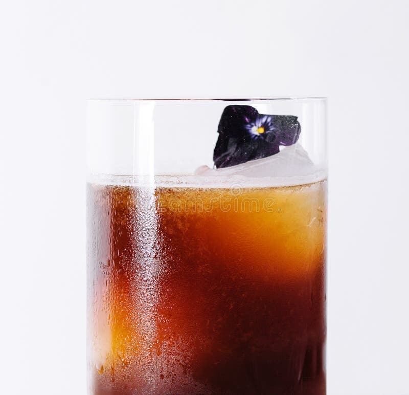 Cold Brew Coffee To Drink with Ice Cubes Decorated with Strawberry ...