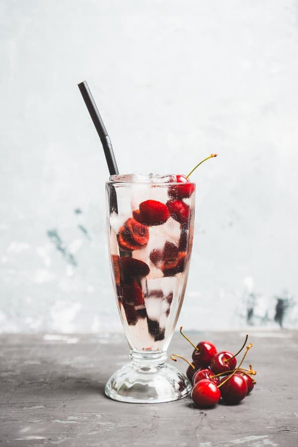 Cold Cherry Cocktail with Ice and Strong Alcohol Stock Image - Image of ...
