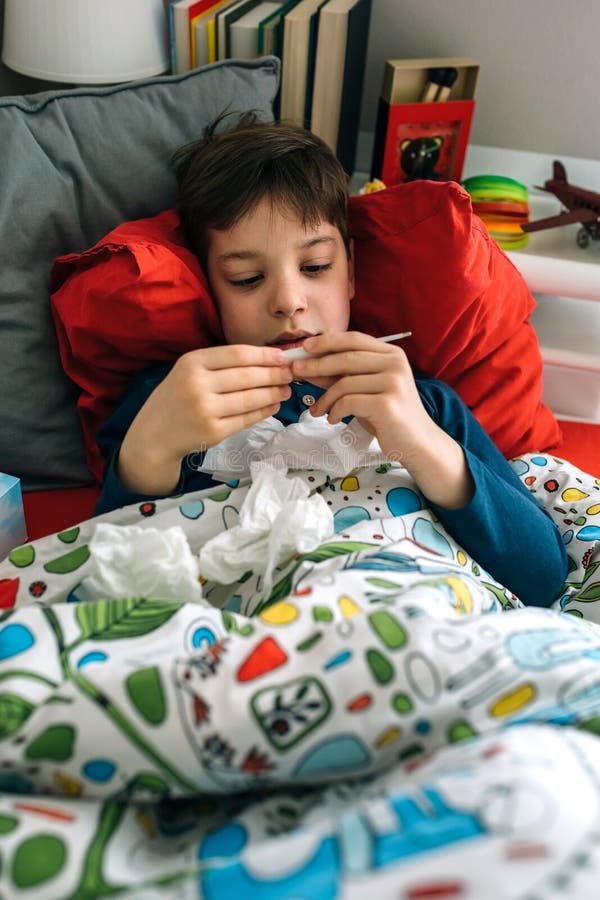 Cold Child Looking at the Thermometer Stock Photo - Image of childhood ...