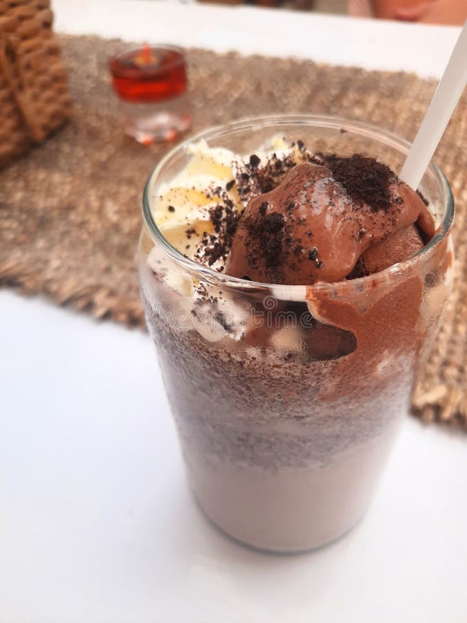 A cold chocolate milkshake stock photo. Image of dish - 249709454