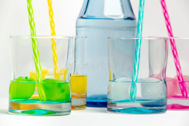 Cold, Clean Water in Rainbow Colored Glasses Stock Image - Image of ...