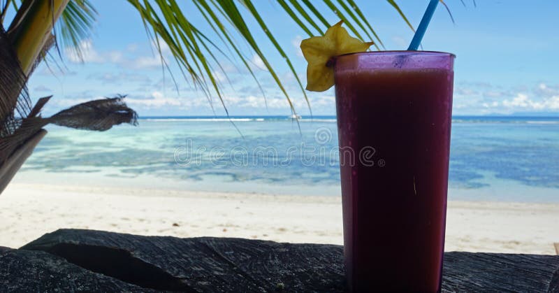 Cold Cocktail at a Tropical Beach Stock Image - Image of exotic, glass ...