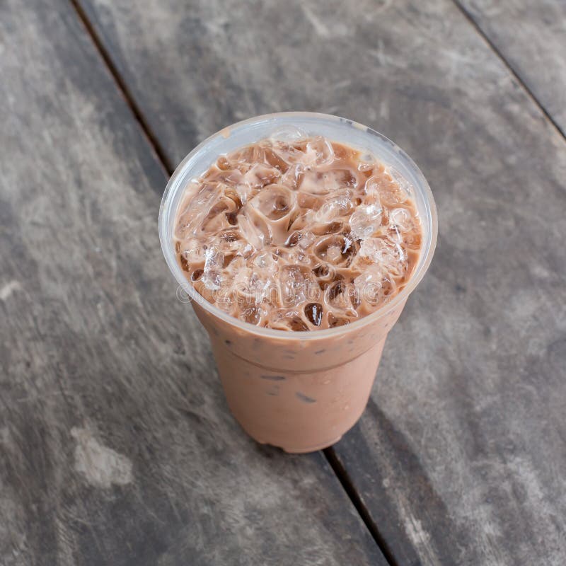 Cold Coffee Drink with Ice on Old Wood Stock Photo - Image of drop ...