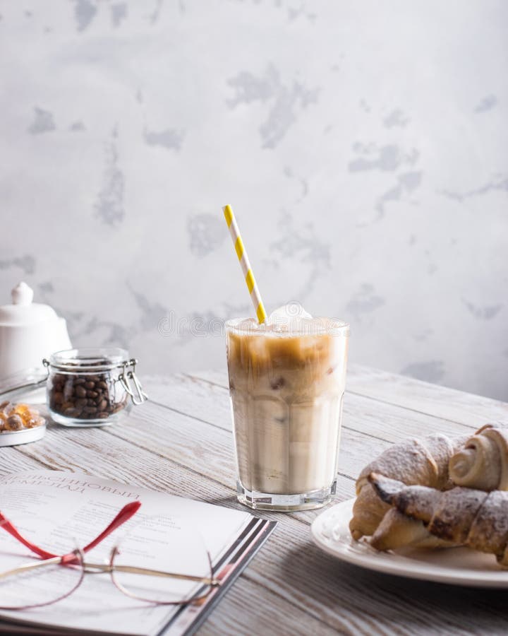Cold Coffee with Ice and Pouring Cream Stock Photo - Image of plate ...