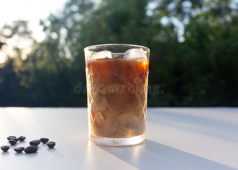 Cold Coffee with Milk in a Glass Glass on the Nature. Stock Image ...