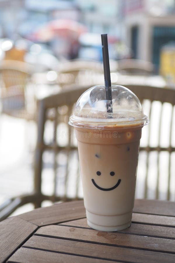 Cold Coffee in a Plastic Container with Smile Shape Design on it Stock ...