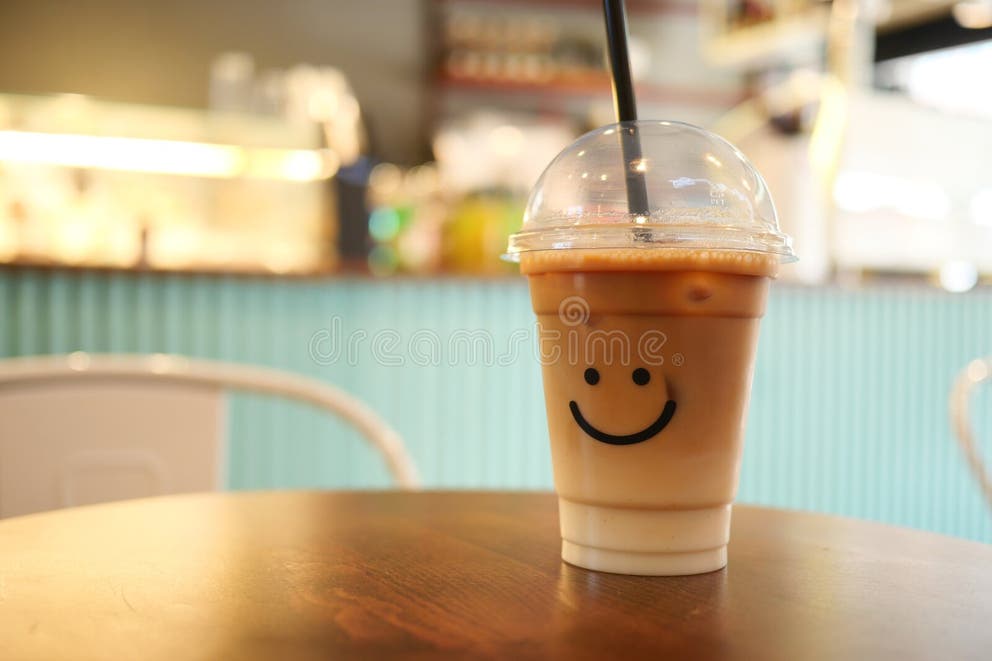 Cold Coffee in a Plastic Container with Smile Shape Design on it Stock ...
