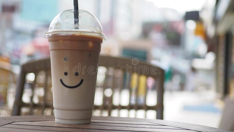 Cold Coffee in a Plastic Container with Smile Shape Design on it Stock ...