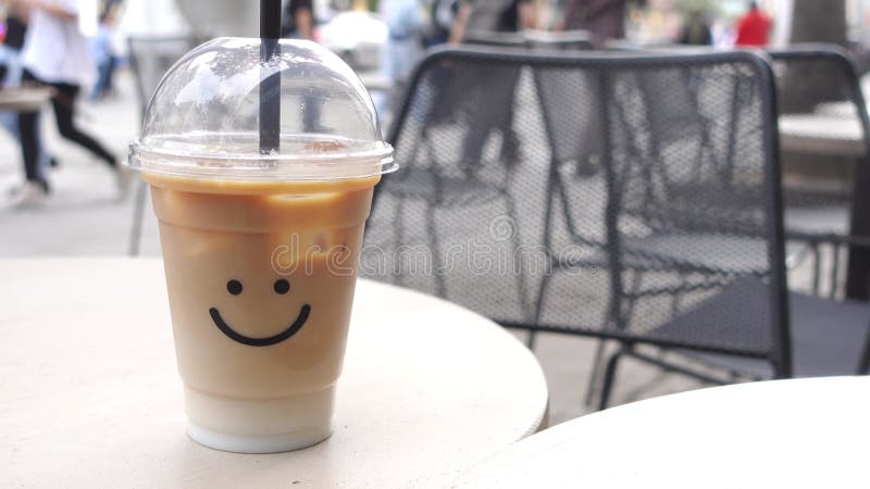 Cold Coffee in a Plastic Container with Smile Shape Design on it Stock ...