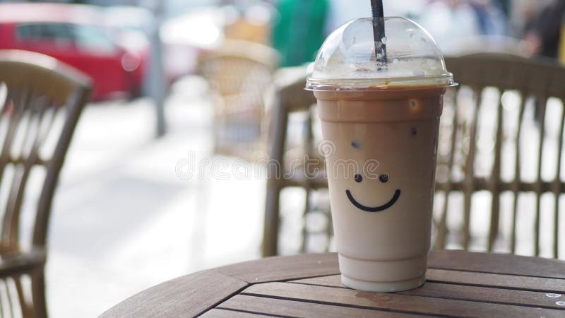 Cold Coffee in a Plastic Container with Smile Shape Design on it Stock ...