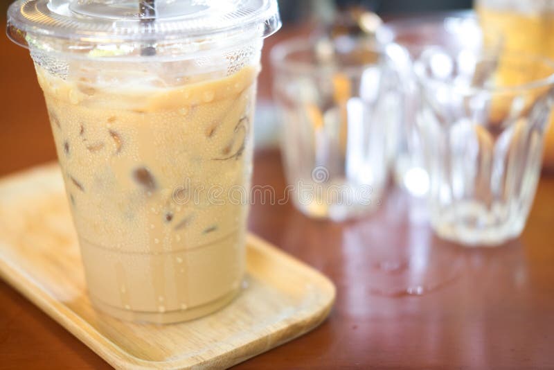 Cold coffee on wood stock photo. Image of dessert, coffee - 80675970