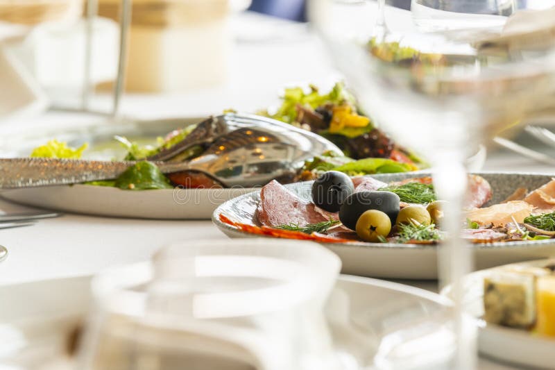 Cold Cuts with Olives and Black Olives on a Served Table Stock Image ...