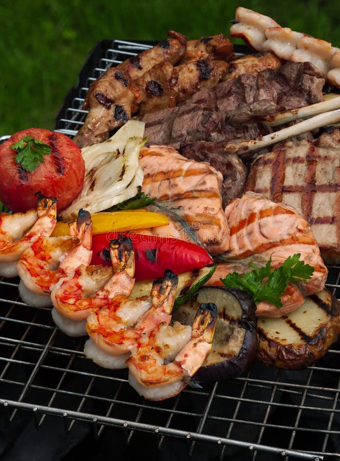 Cold Cuts, Prawns and Fish Cooked on the Grill Stock Photo - Image of ...