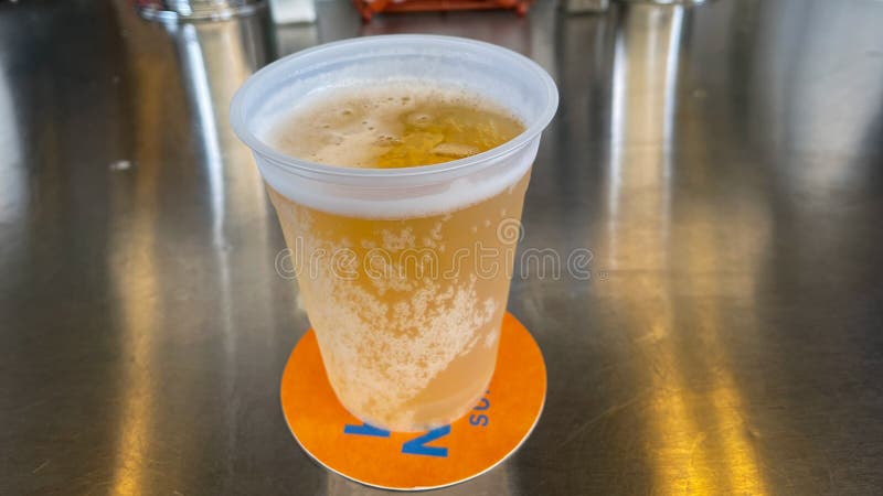 A Cold Draft Beer in a Glass Sitting on a Bar in Florida Stock Photo ...