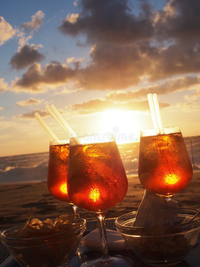 Cold drink at the beach stock image. Image of glasses - 45086315