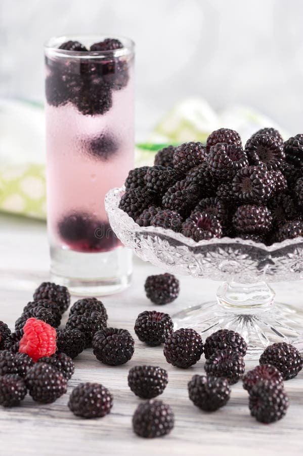 A Cold Drink with Black Raspberries . Vase with Raspberries . Raspberry ...
