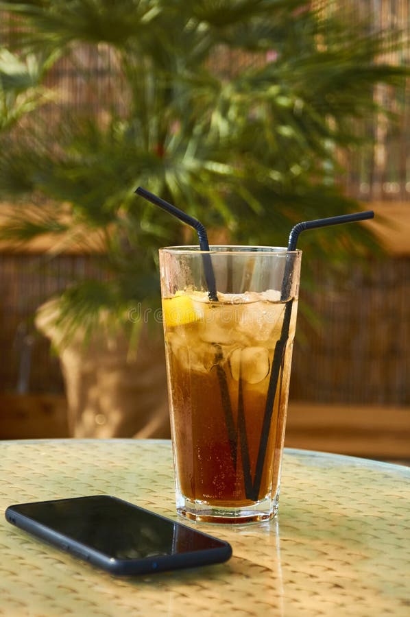 Cold Drink Cocktail and Telefon on the Table. Summer Rest Stock Photo ...