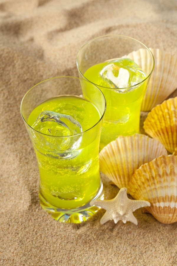 Drinks, Shells and Ice Cubes on the Beach Stock Photo - Image of ...