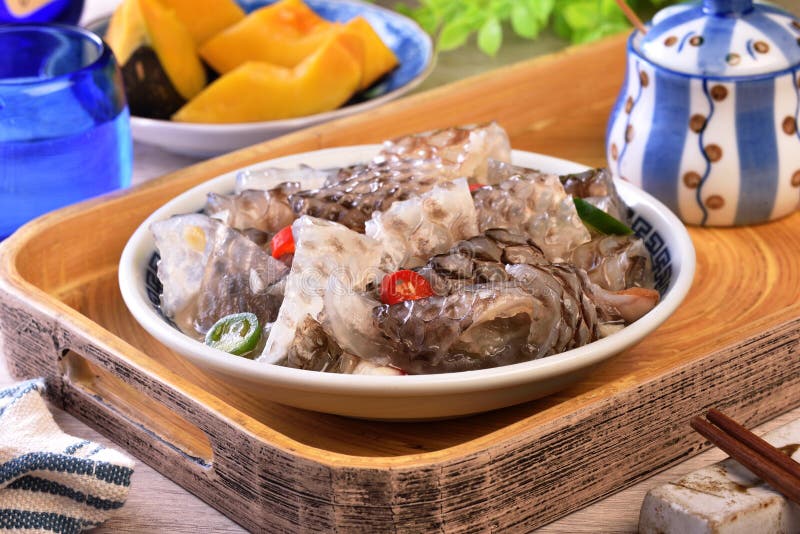 Cold fish skin in sauce stock photo. Image of spice - 273286328