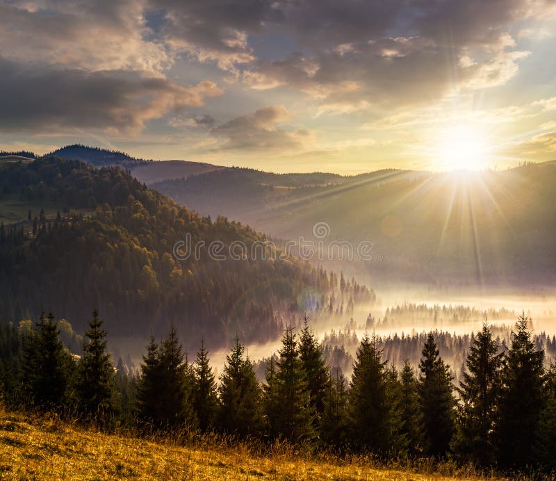Cold Fog on Hot Sunset in Mountains Stock Photo - Image of outdoor ...