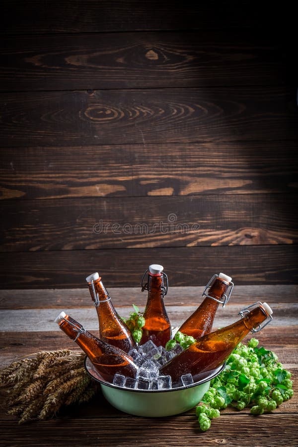 Cold and Fresh Cider Beer on Ice Stock Image - Image of drinks, bottle ...