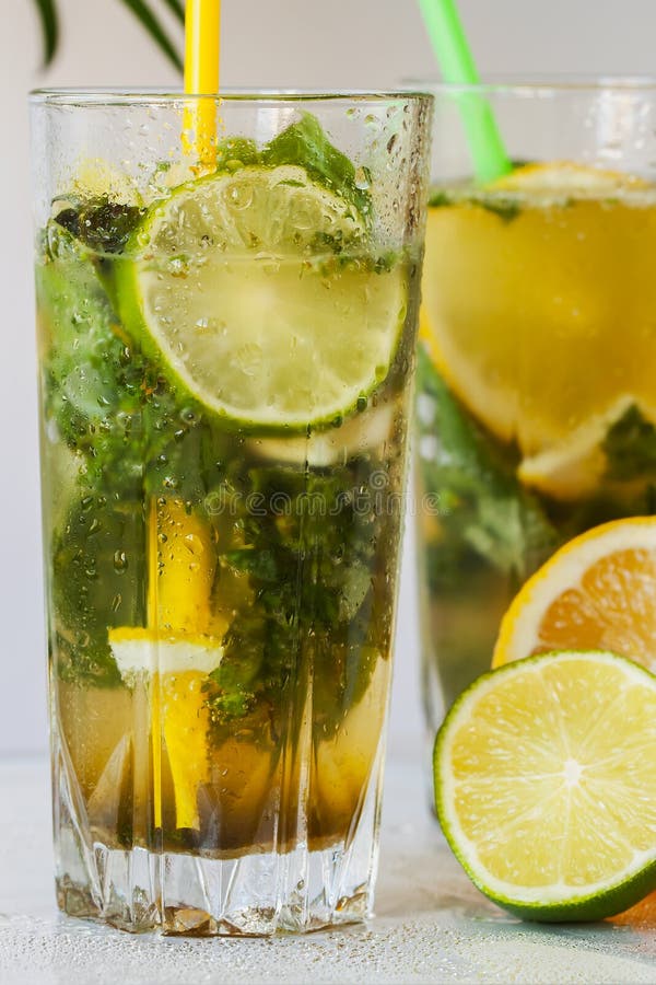 Cold Fresh Lemonade with Ice, Lime and Lemon Stock Photo - Image of ...