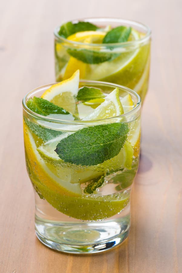 Cold Fresh Lemonade with Lemon, Lime and Mint Stock Photo - Image of ...