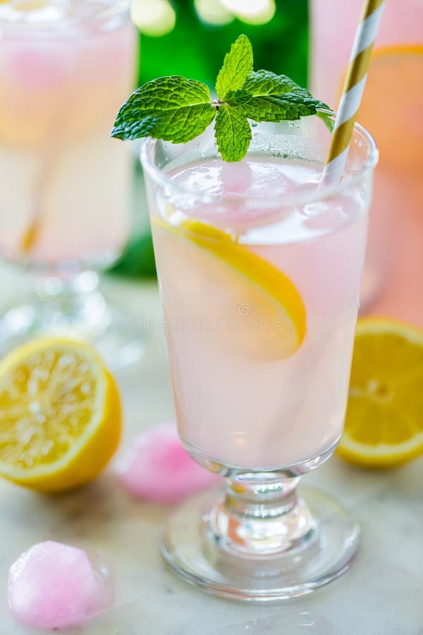 Cold and Frosty Lemonade with Pink Lemonade Ice Cubes, Ready for ...