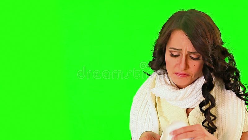Cold Girl Blowing His Nose on Green Screen. Stock Video - Video of ...