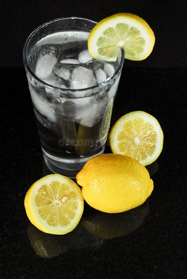 Cold Glass of Ice Water with Lemon. Stock Photo - Image of fruit ...