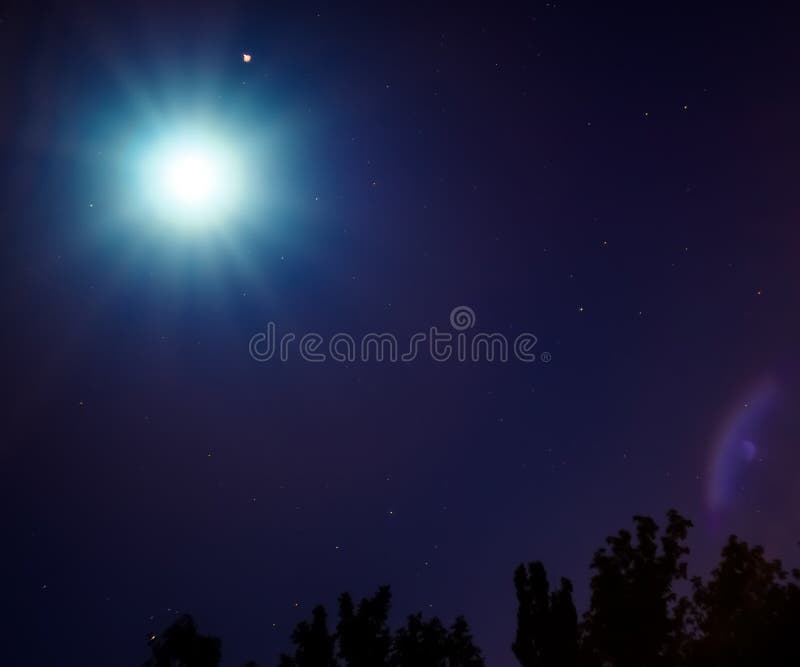 The Cold Glow of the Moon at Night in the Starry Sky, Lunar Blue Rays ...