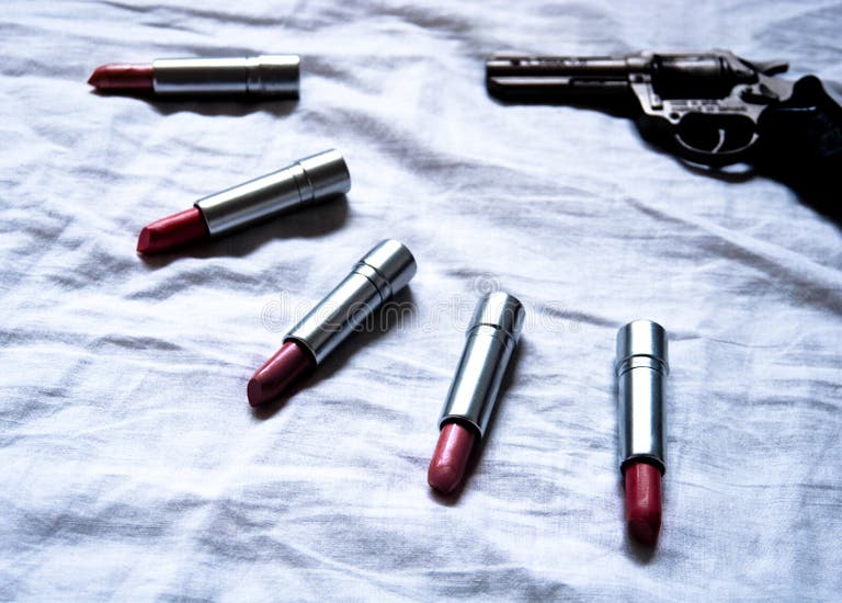 Cold gun with lipsticks stock photo. Image of beauty, temptation - 2485116